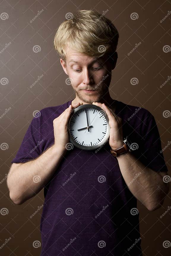 Young Man Thinking about Time Stock Photo - Image of clock, male: 12663356