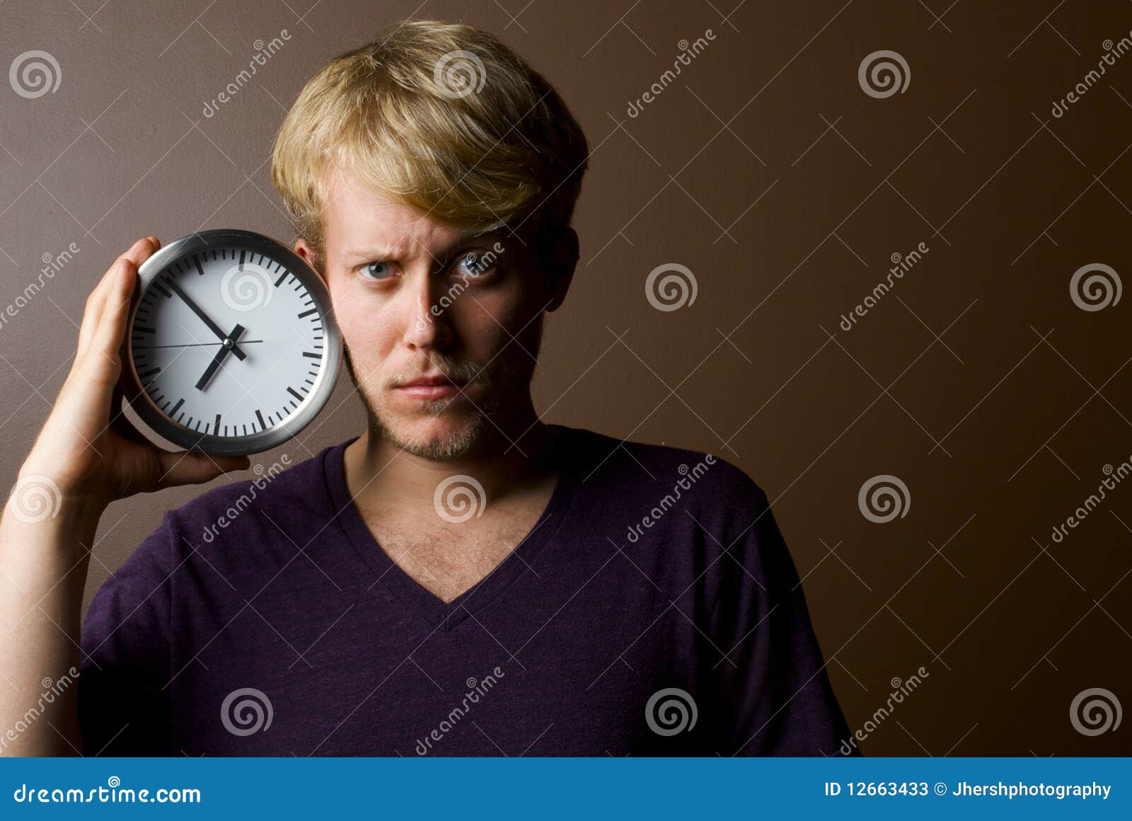 Young Man Thinking about Time Stock Image - Image of male, long: 12663433