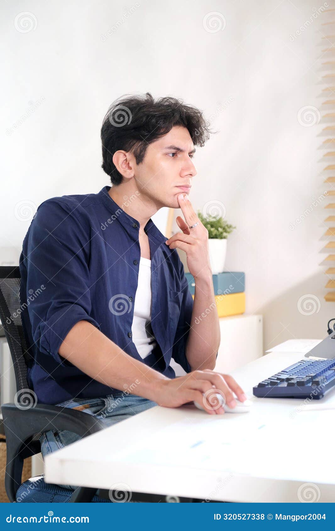 Young Man Thinking while Working with Computer at Home Office, Work ...