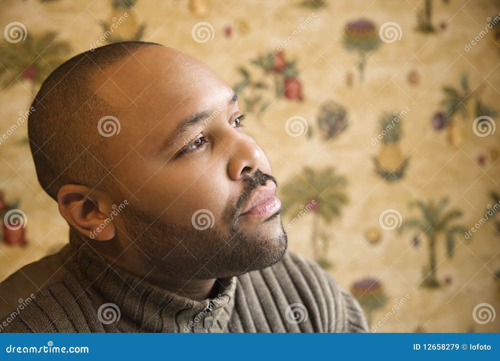 Young Man with Thoughtful Gaze Stock Image - Image of short, headshot ...