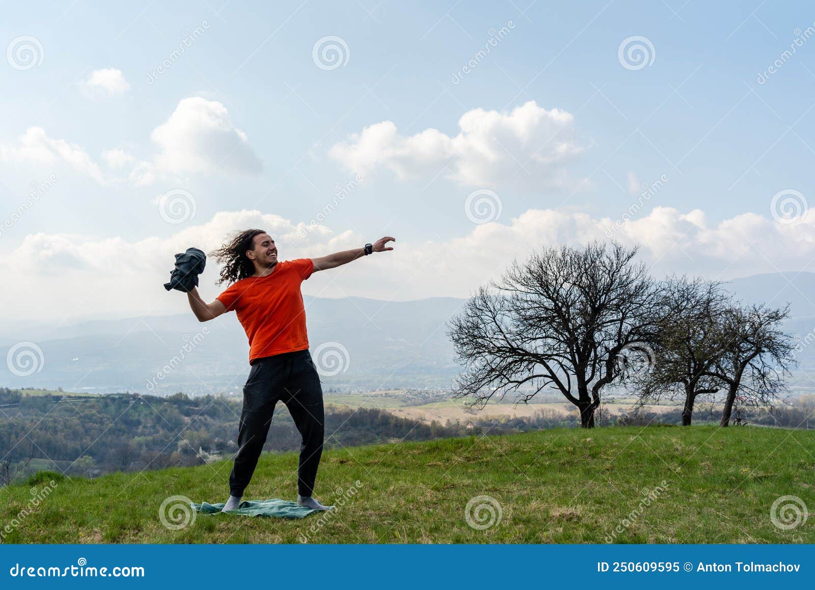 Young Man Throwing a Jacket in the Air on Mountain Stock Image - Image ...