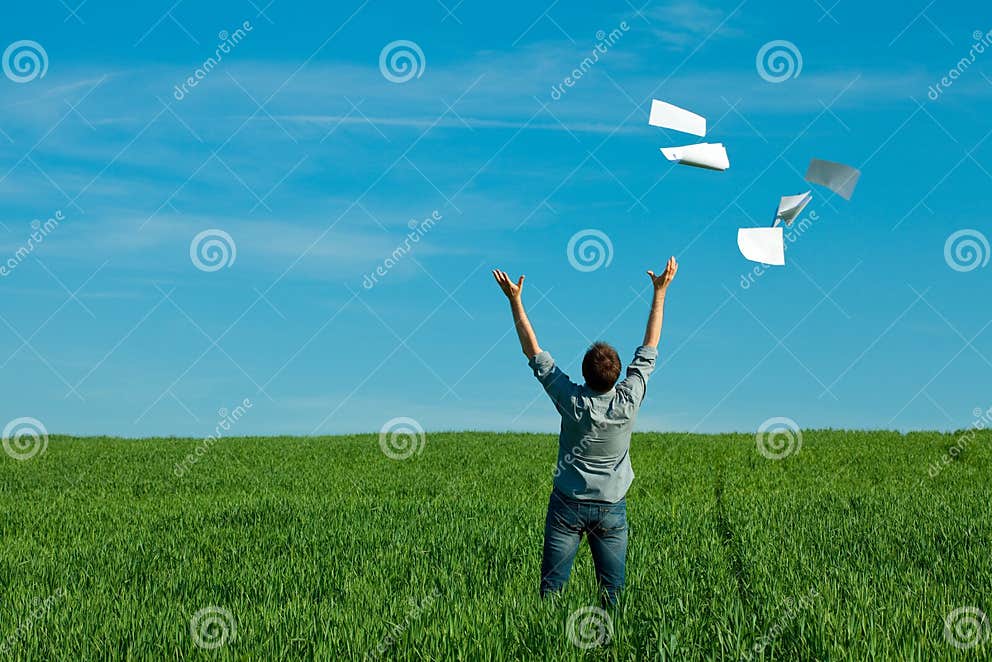 Young man throwing a paper stock image. Image of business - 16737763