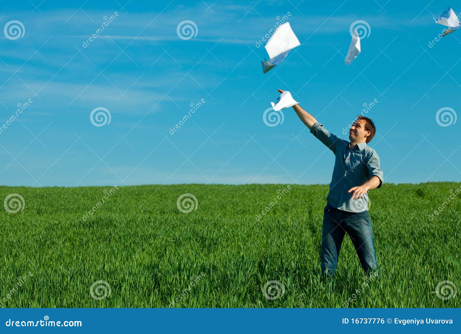 Young man throwing a paper stock photo. Image of satisfaction - 16737776