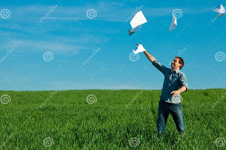Young man throwing a paper stock photo. Image of satisfaction - 16737776