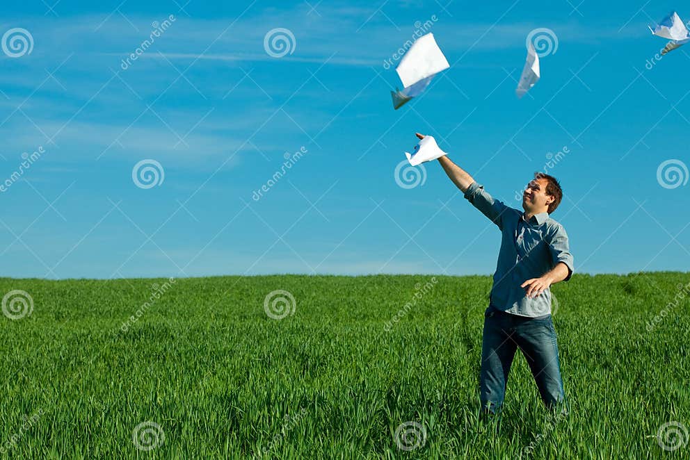 Young man throwing a paper stock photo. Image of satisfaction - 16737776