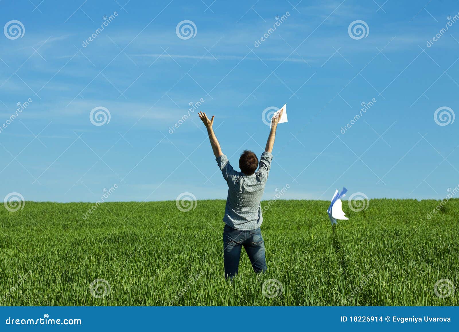 Young man throwing a paper stock photo. Image of motion - 18226914