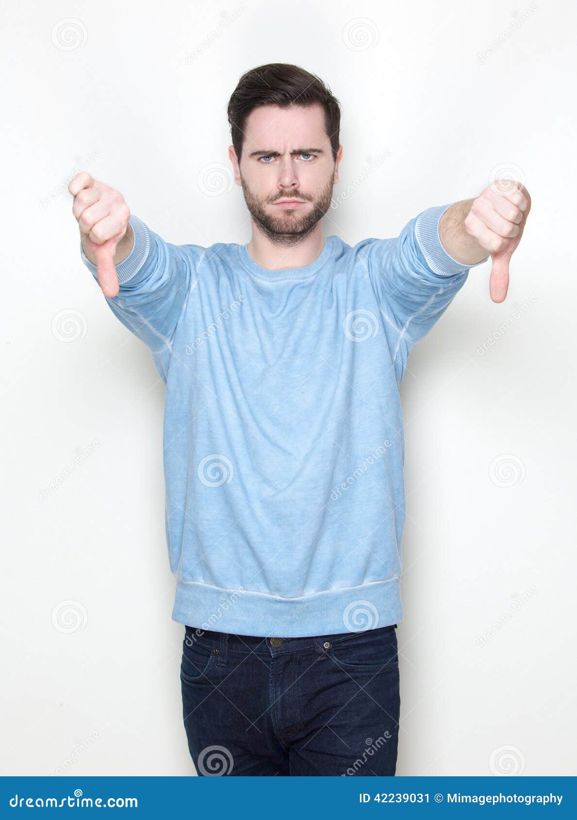 Young Man with Thumbs Down Sign Stock Image - Image of cute, negative ...