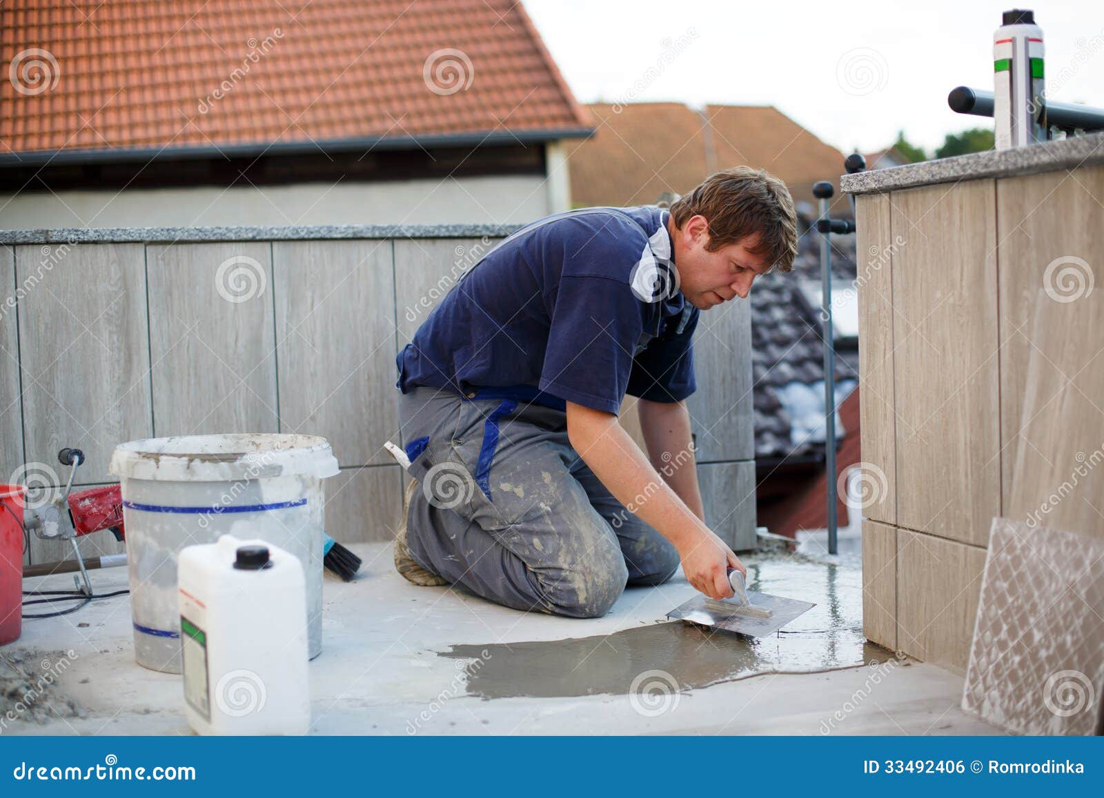 Young Man Tiling on Balkony Ceramic Tiles Stock Photo - Image of tool ...