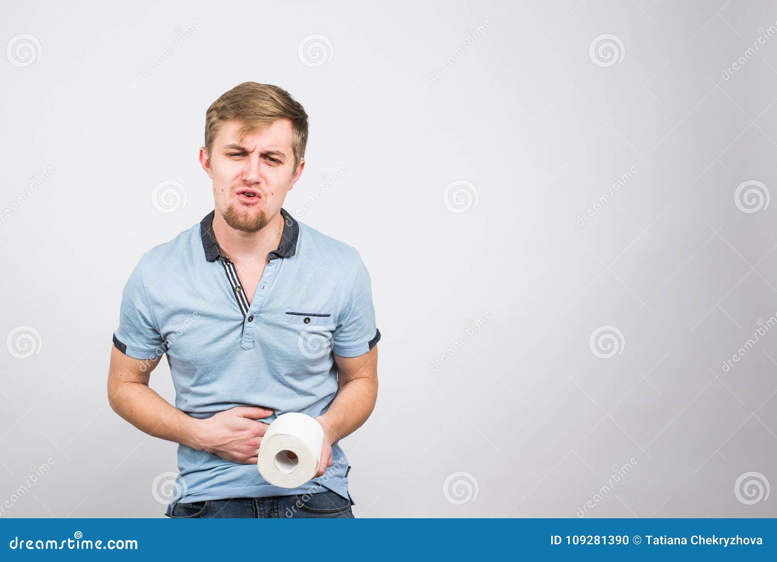 Young Man with Toilet Paper on the White Background - Health Problem ... Young Man with Toilet Paper on the White Background - Health Problem ...