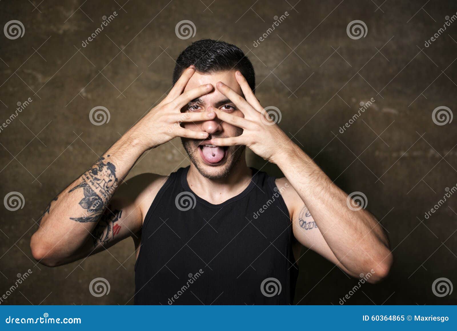 Young Man with Tongue Piercing Stock Image - Image of modern, casual ...