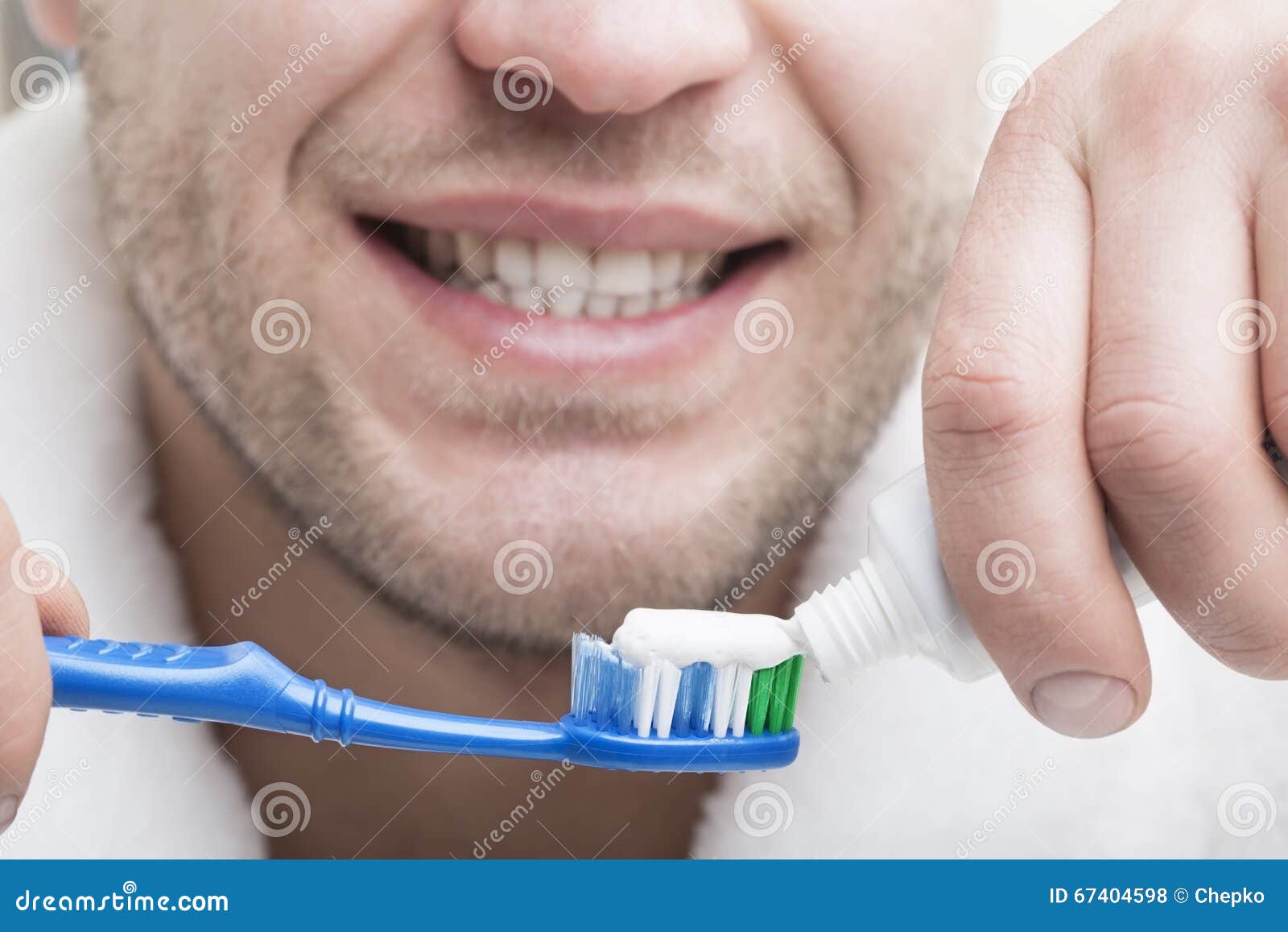 Young man with toothbrush stock photo. Image of beauty - 67404598