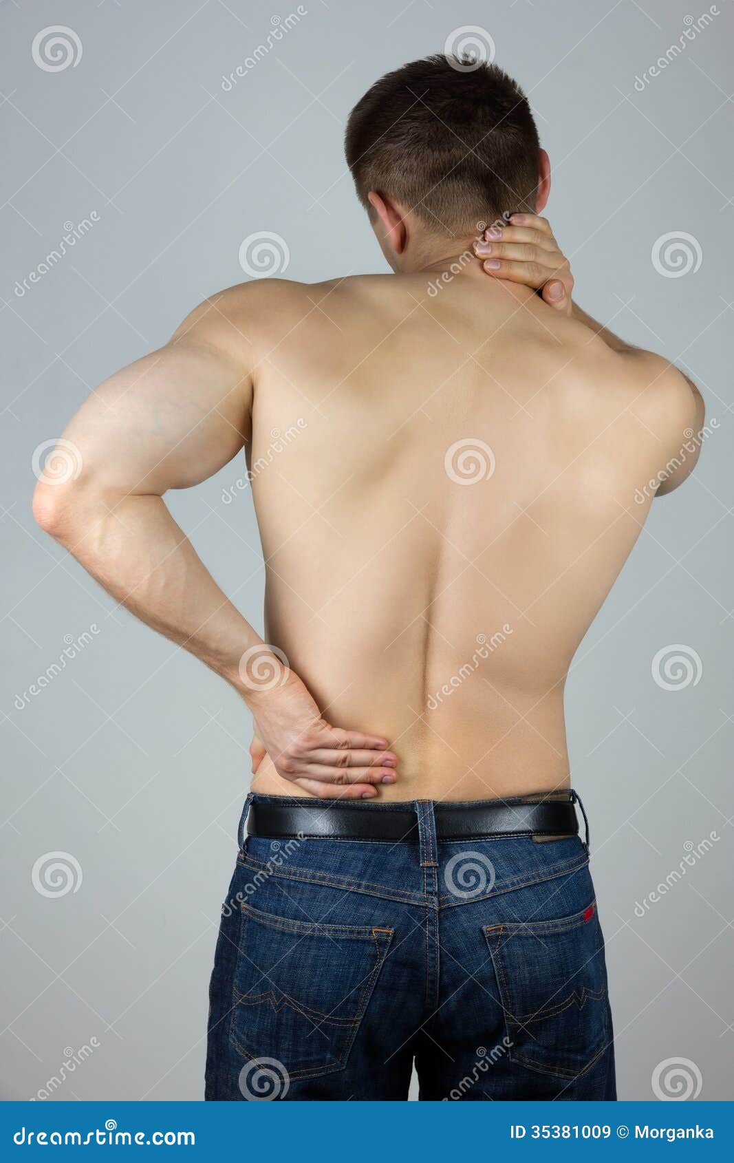 Young Man Touching His Back and Neck for the Pain Stock Image - Image ...
