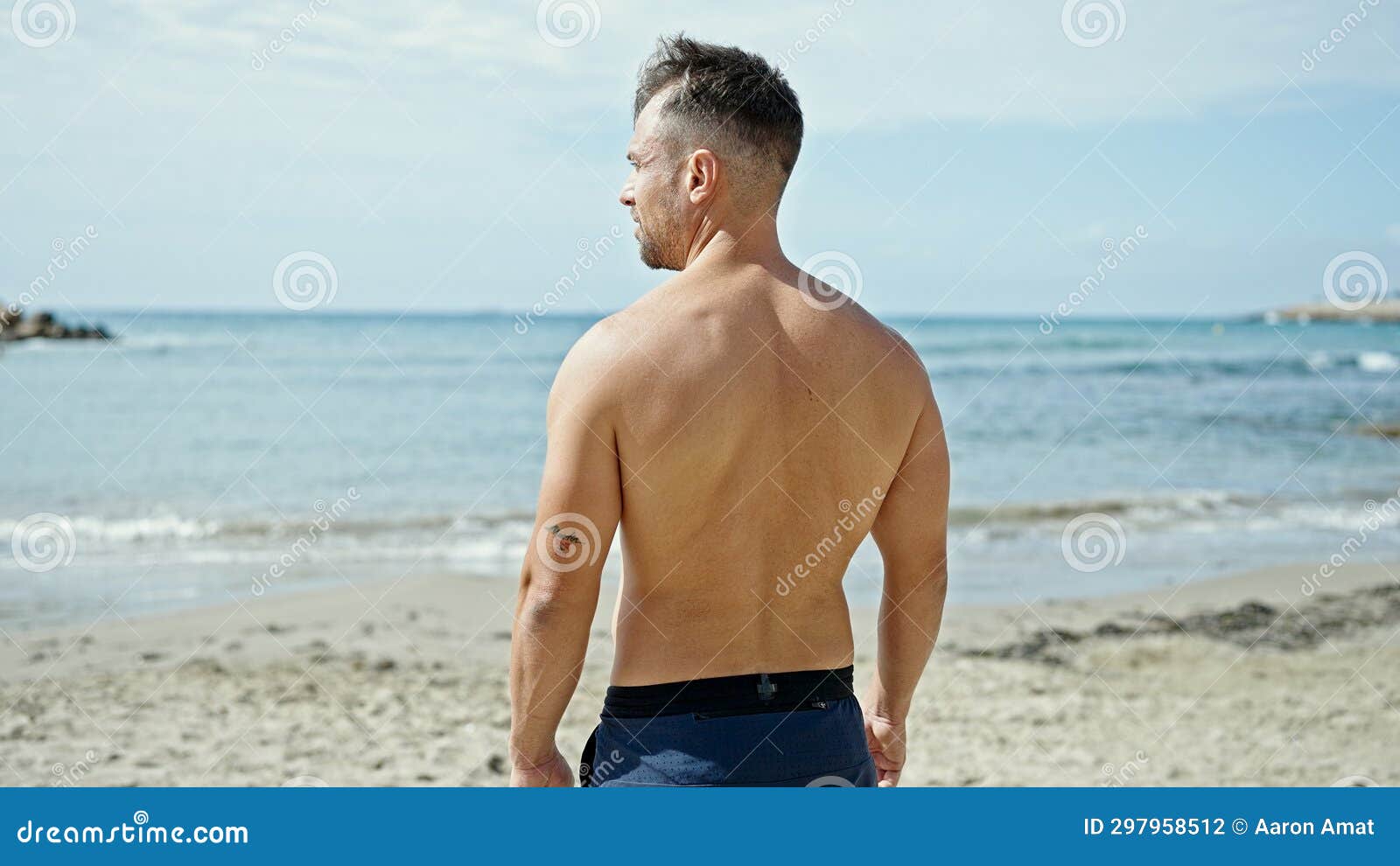 Young Man Tourist Standing Backwards Looking Around at the Beach Stock ...