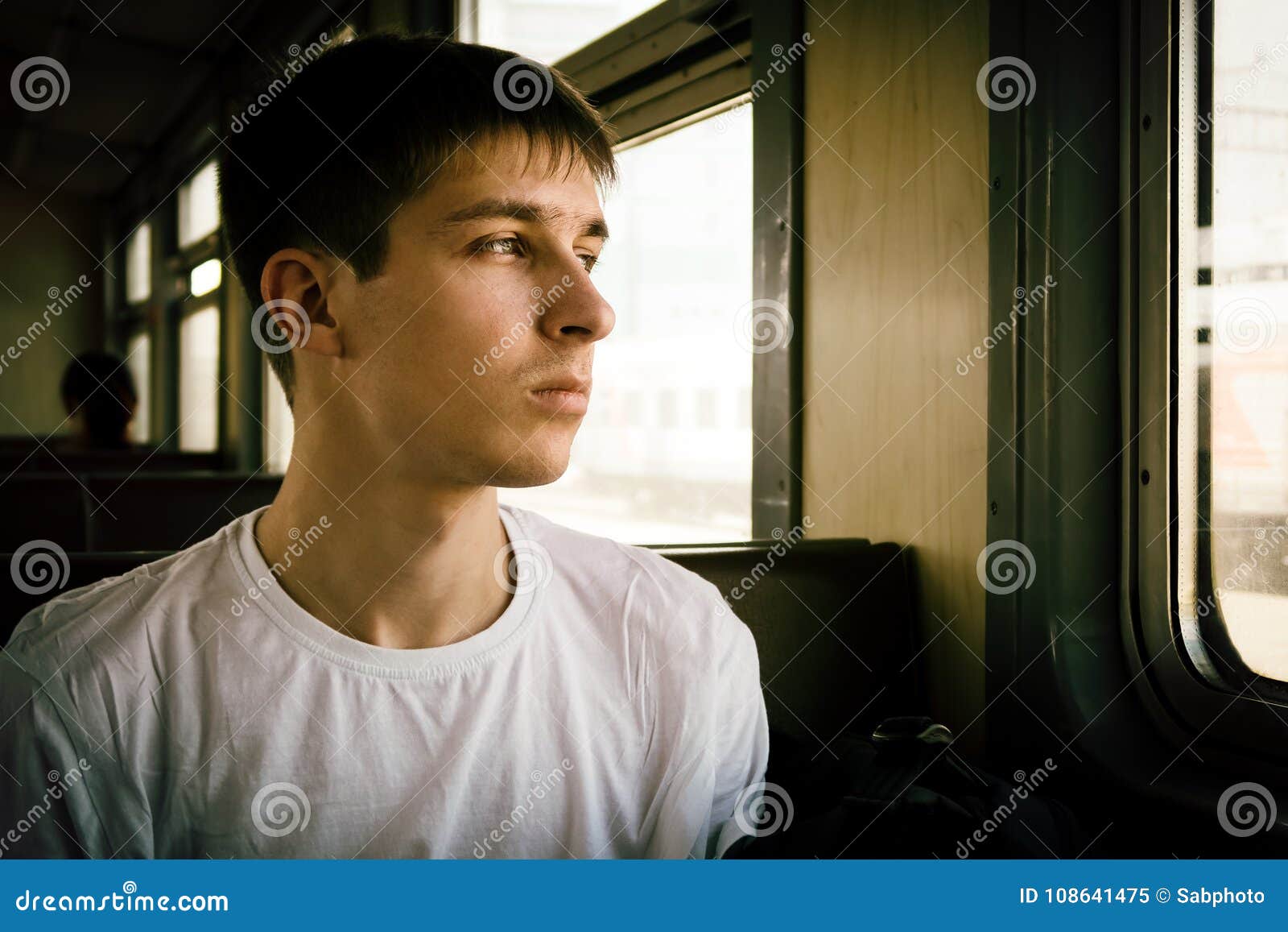 Young Man in the Train stock image. Image of outgoing - 108641475