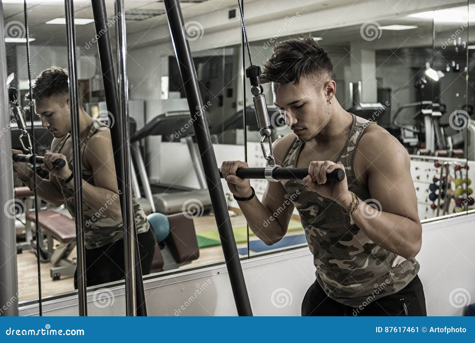 Young Man Training on Gym Equipment Stock Image - Image of person ...