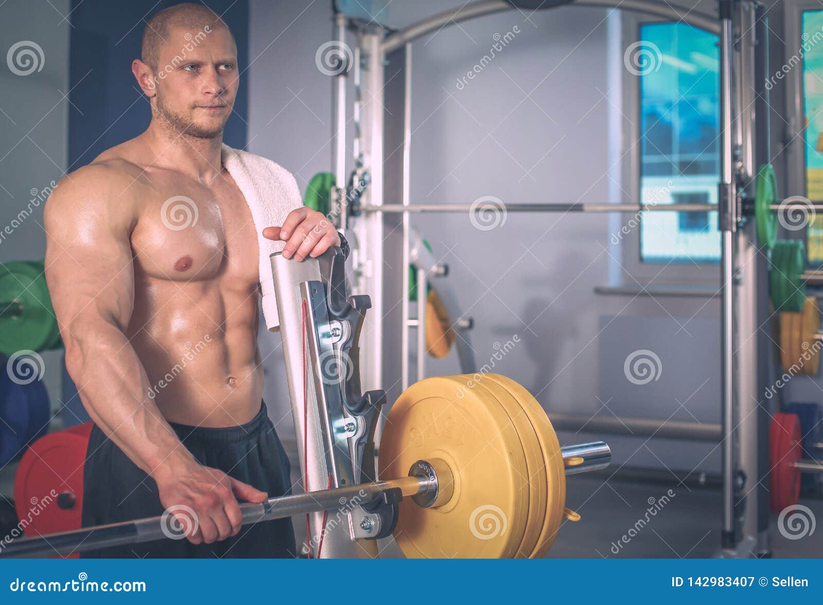 Young Man Training at Gym with Exercises . Young Man Stock Image ...