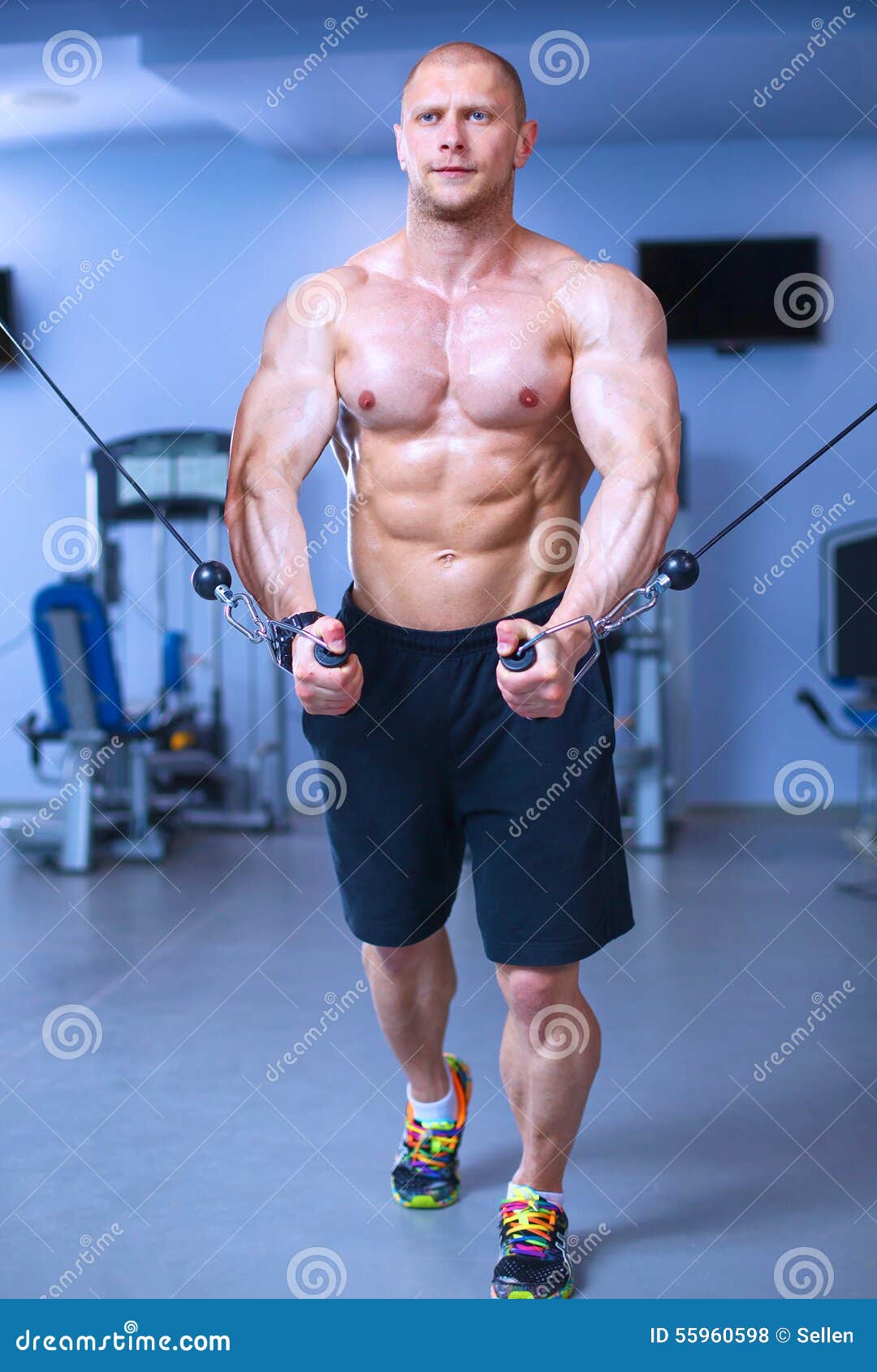 Young Man Training at Gym with Exercises Stock Photo - Image of ...