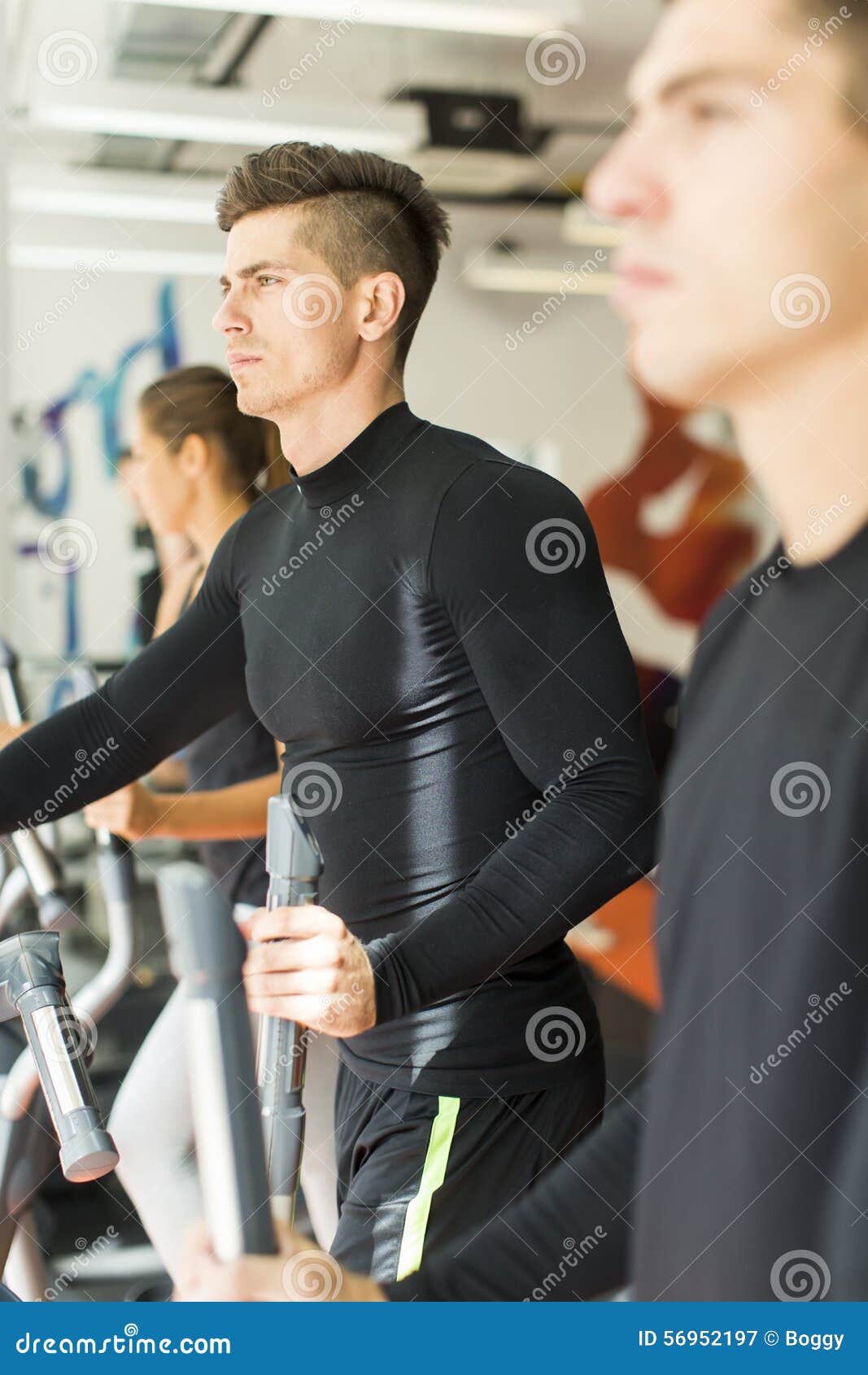 Young Man Training in the Gym Stock Image - Image of equipment, body ...