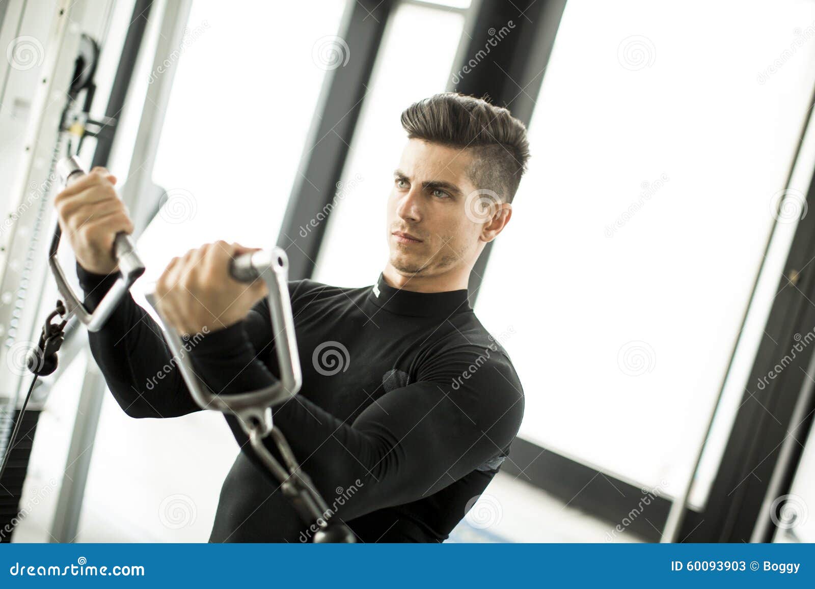 Young Man Training in the Gym Stock Image - Image of male, exercise ...