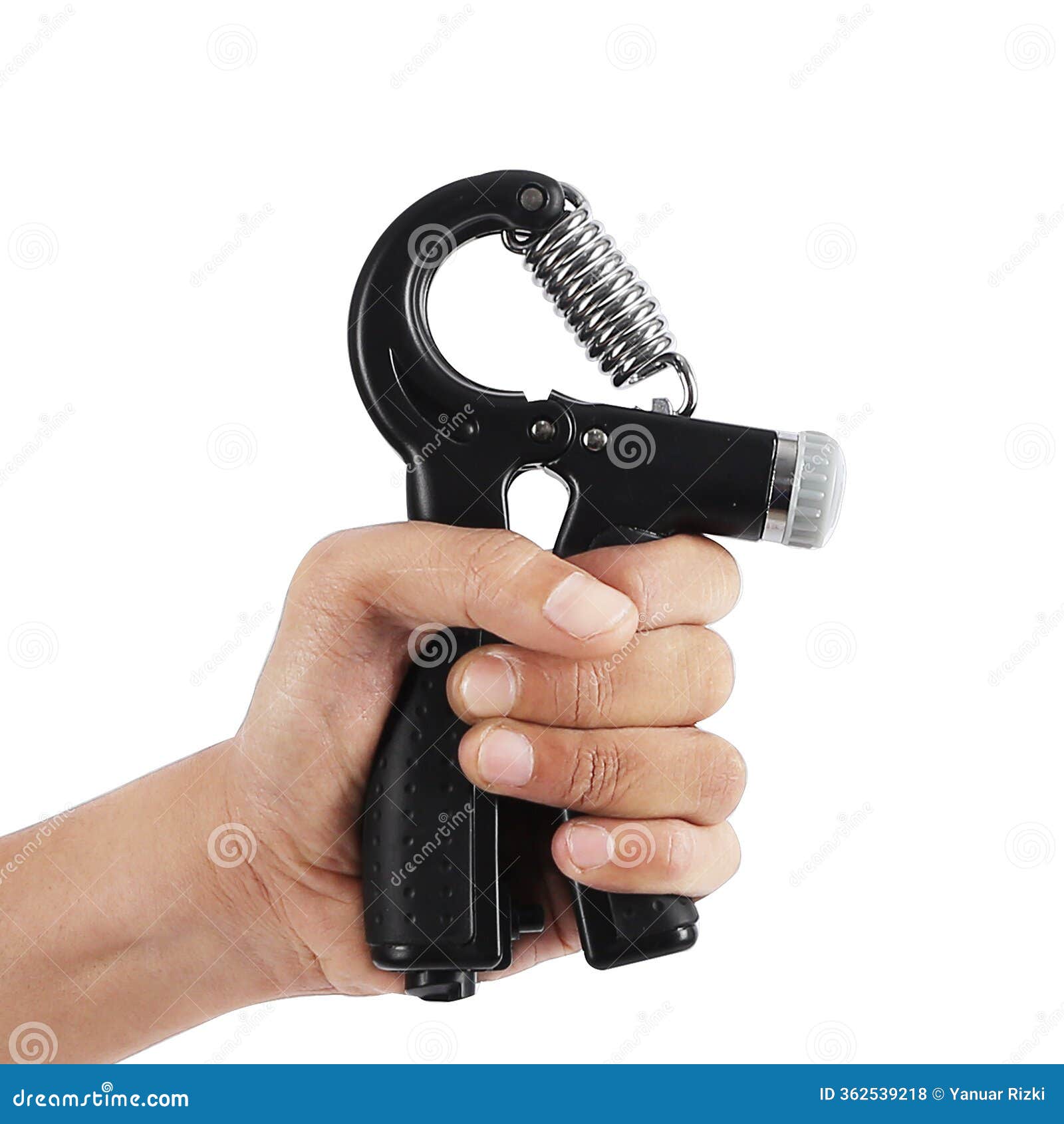 Young Man Training Hand Muscles Using Fitness Hand Grips Stock Photo ...