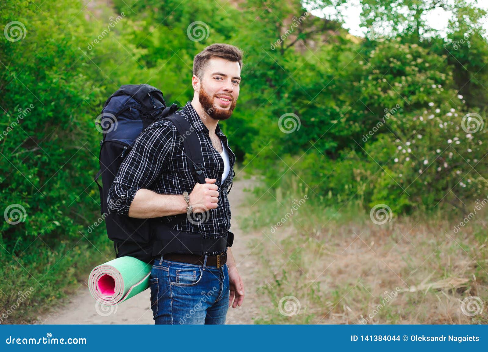 Young Man Traveler with Backpack Relaxing Outdoor. Summer Vacations and ... Young Man Traveler with Backpack Relaxing Outdoor. Summer Vacations and ...