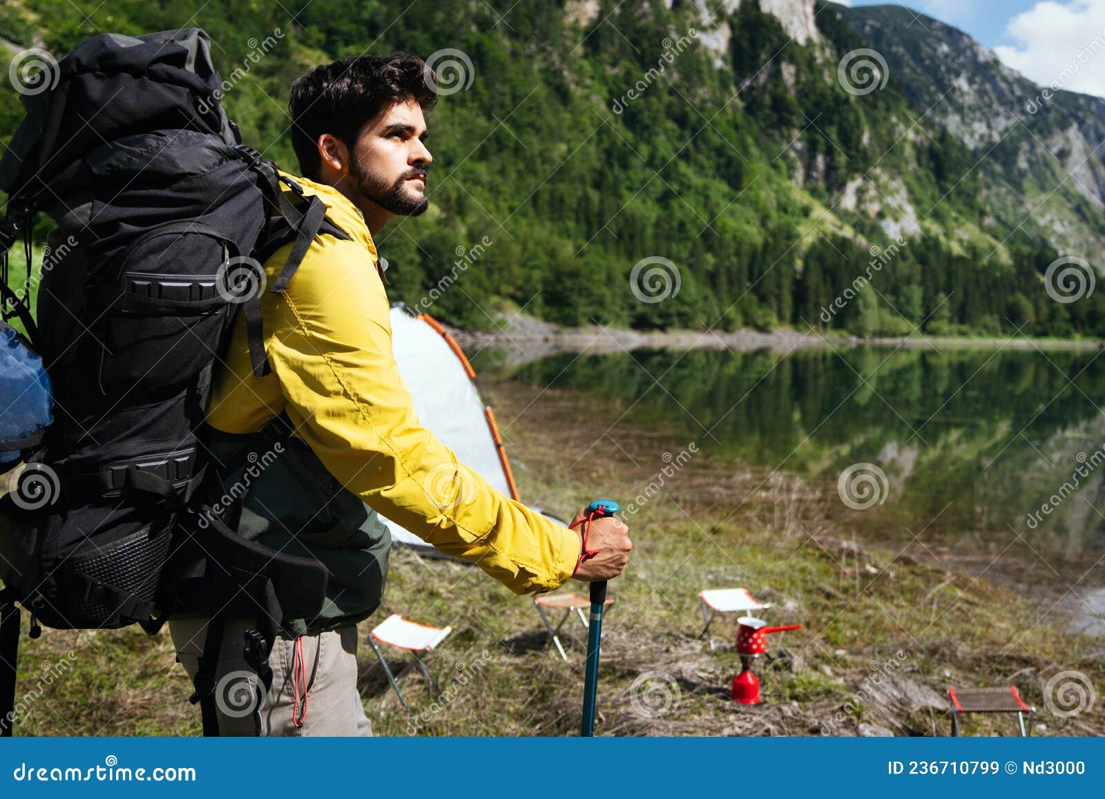 Young Man Traveling with Backpack Hiking in Mountains Stock Image ...