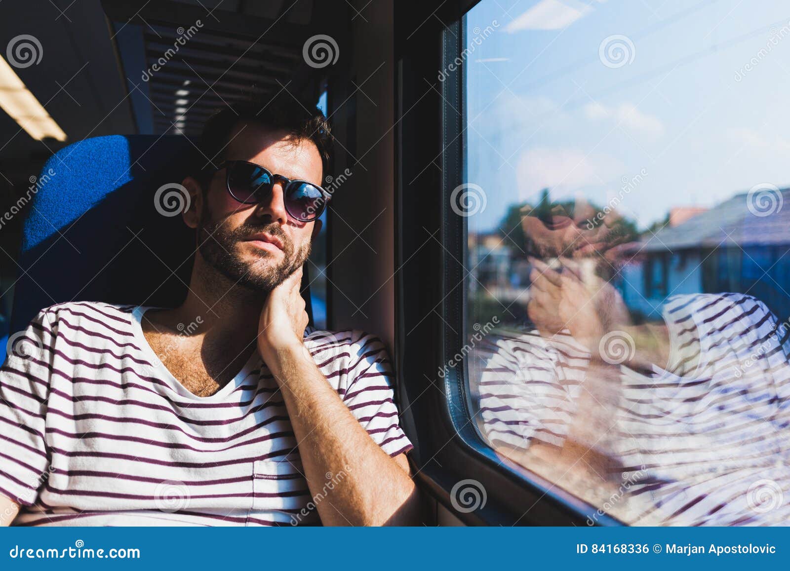 Young Man Traveling on a Train Stock Photo - Image of happy ...