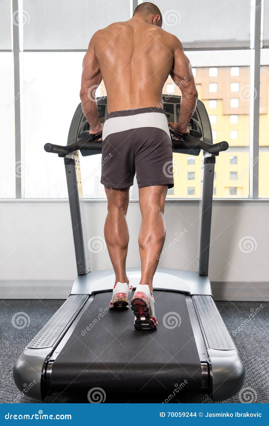 Young Man on Treadmill Back View Stock Photo - Image of fast, legs ...