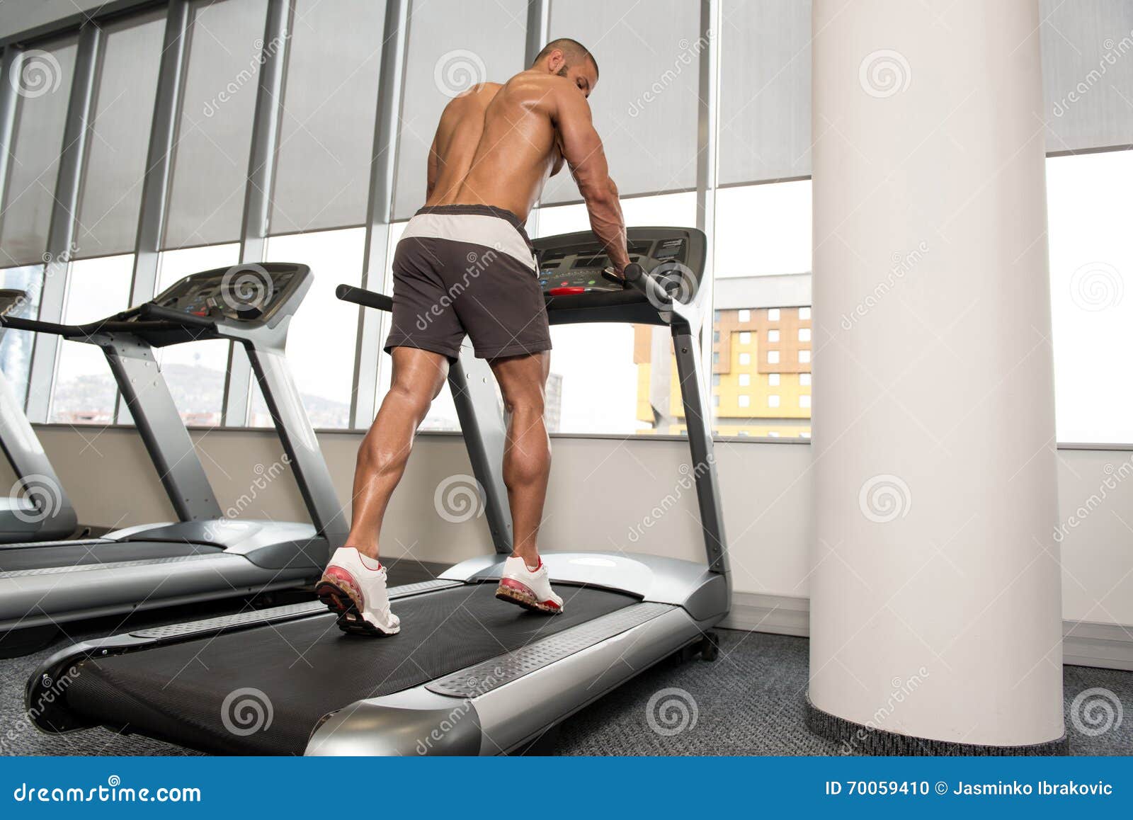 Young Man on Treadmill Back View Stock Photo - Image of health ...