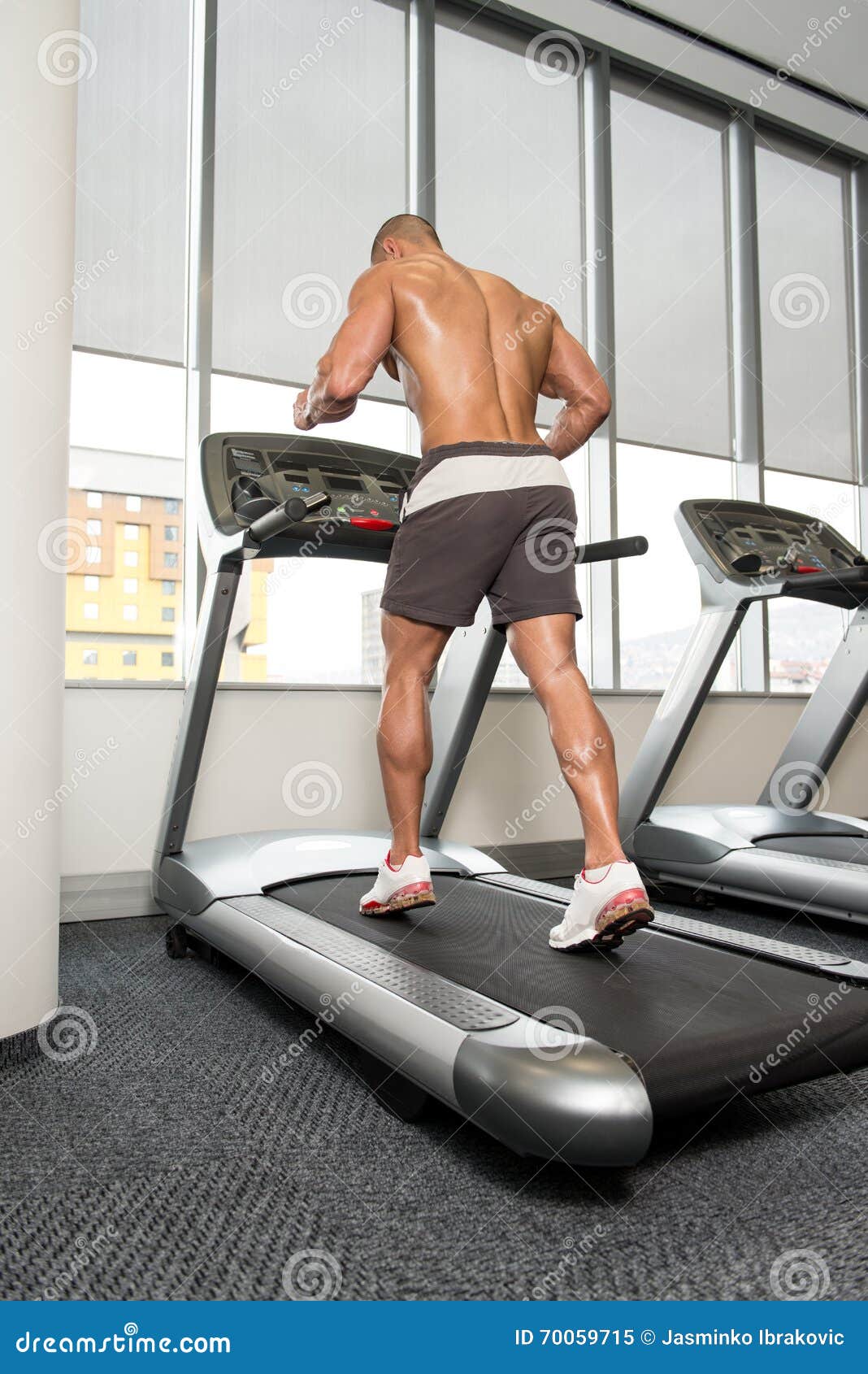 Young Man on Treadmill Back View Stock Image - Image of health ...