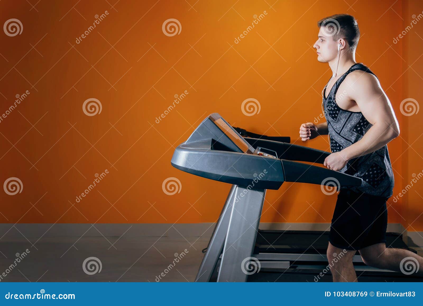 Young man on the treadmill stock image. Image of health - 103408769