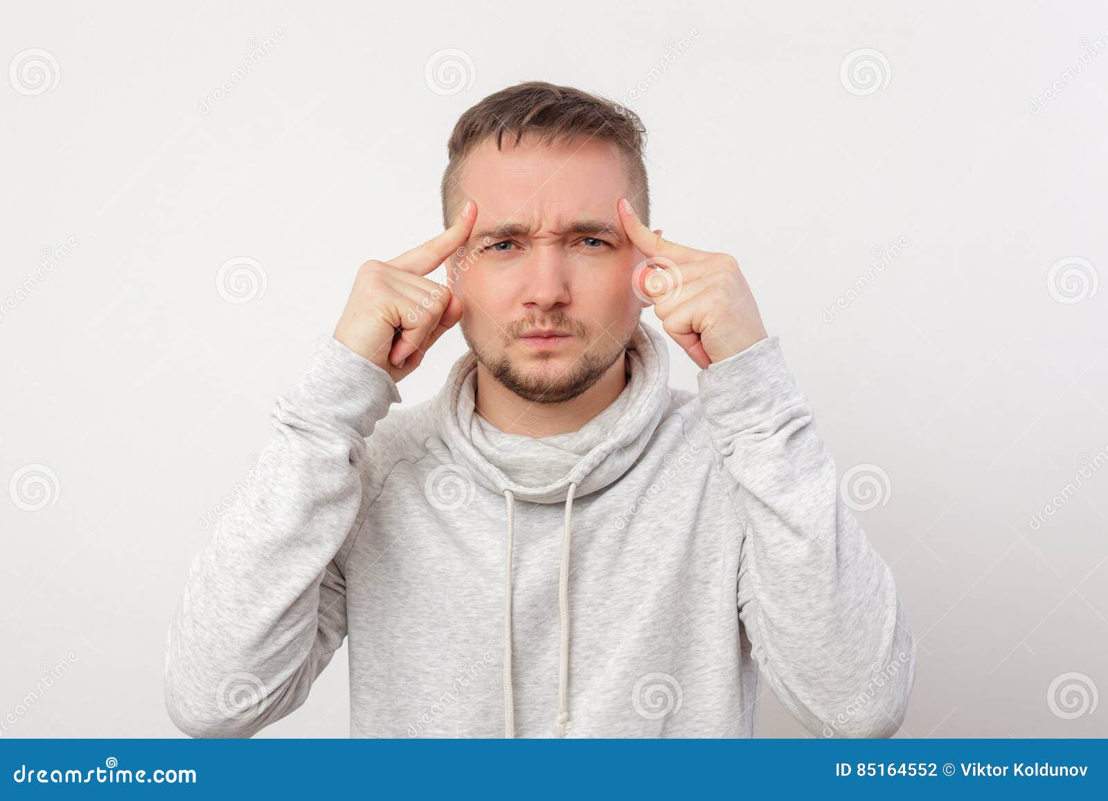 Young Man Tries To Concentrate Hard and To Think Stock Photo - Image of ...