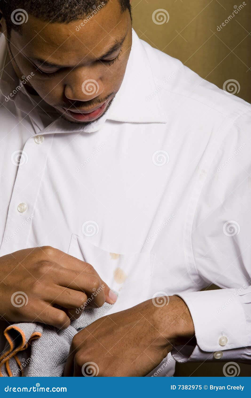 Young Man Trying To Clean a Stain Stock Image - Image of soil, white ...