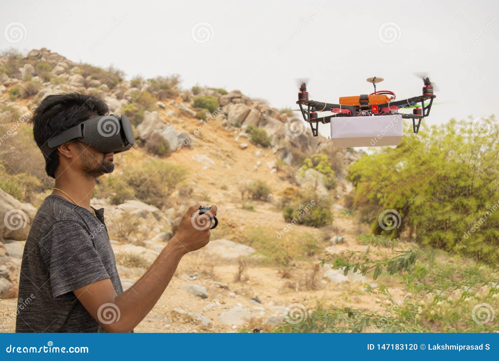 Young Man Trying To Control Drone by Controller by Seeing at Virtual ...