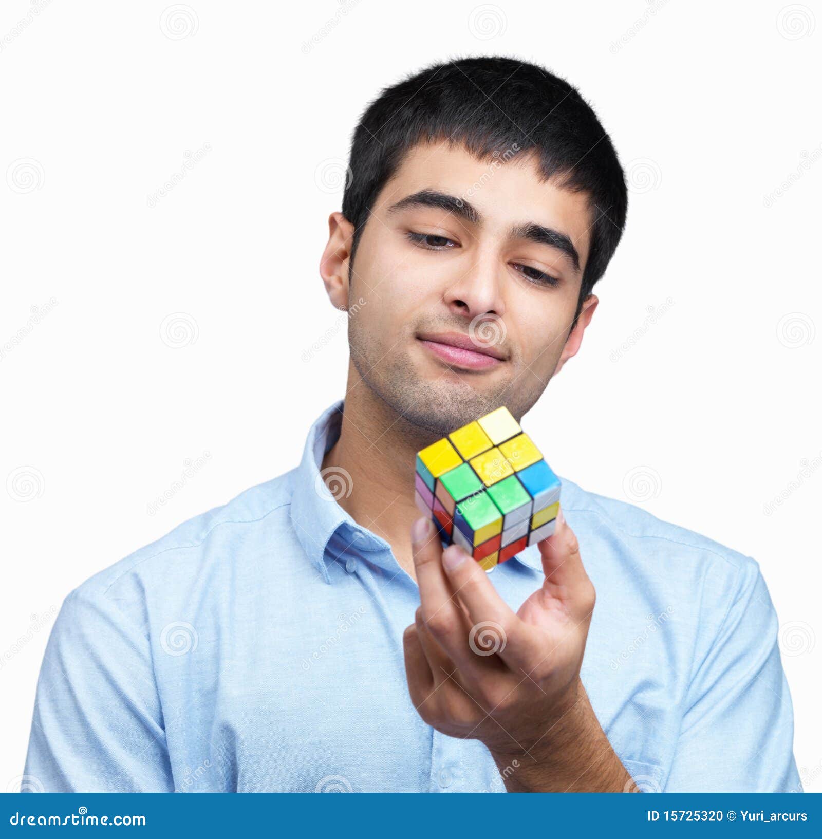 Young Man Trying To Resolve the Puzzle of Cube Editorial Image - Image ...