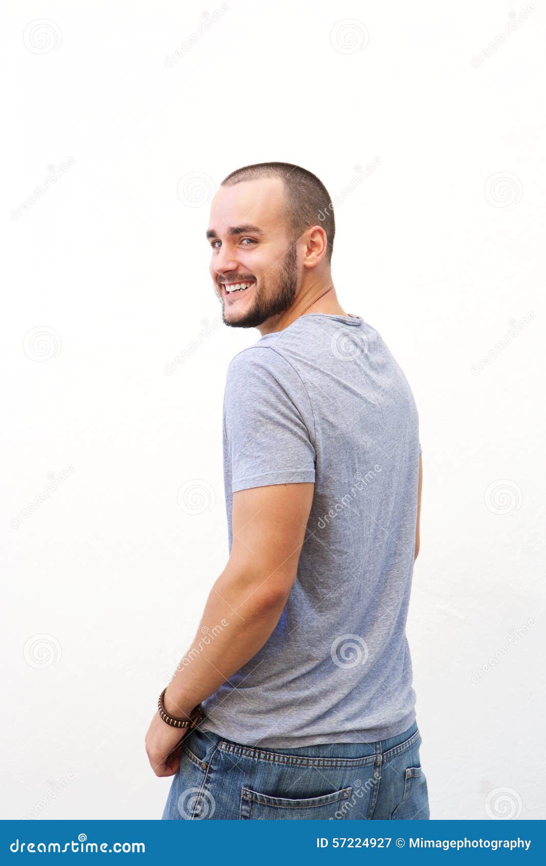 Young Man Turning Around and Smiling Stock Image - Image of cute ... Young Man Turning Around and Smiling Stock Image - Image of cute ...