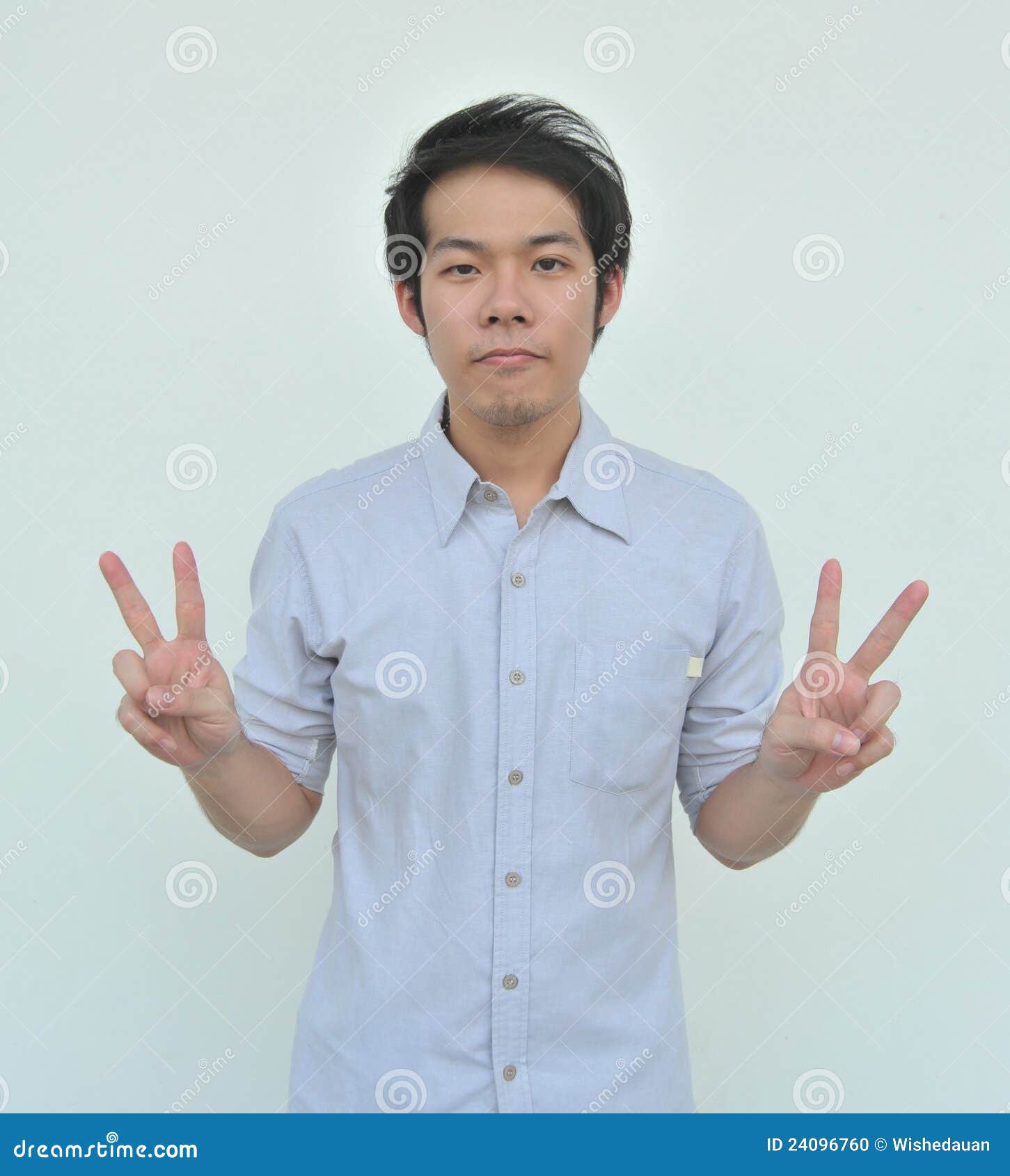 Young man two fingers stock photo. Image of modern, studio - 24096760