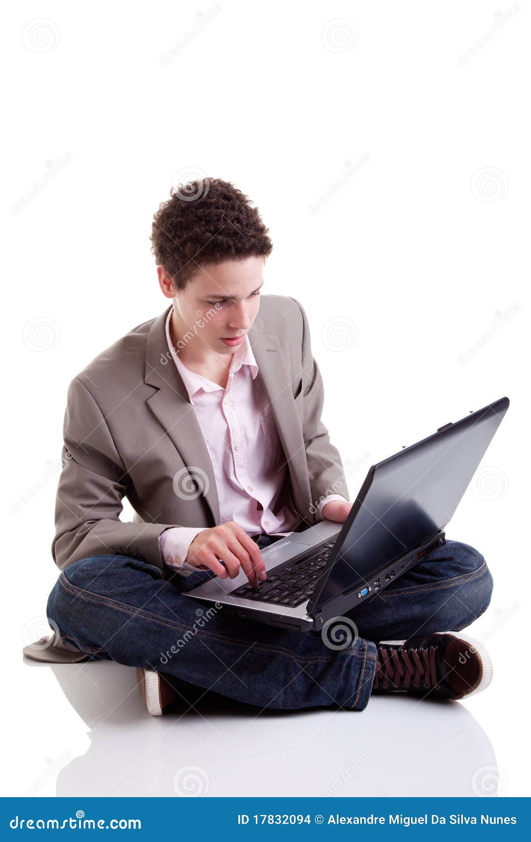 Young Man Typing and Looking at Screen of Laptop Stock Photo - Image of ...