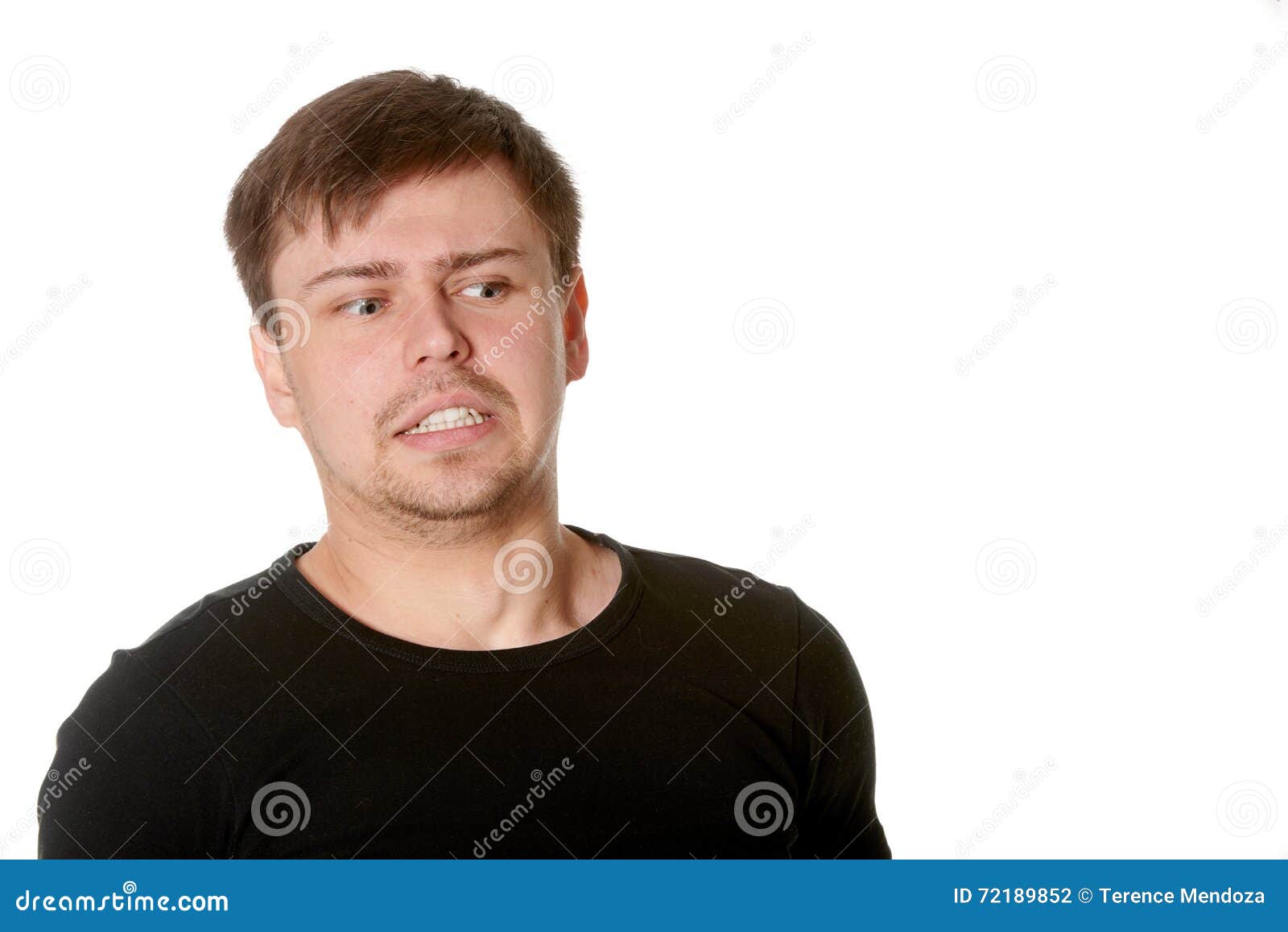Young Man with Uncertain Puzzled Expression, Isolated on White Stock ...