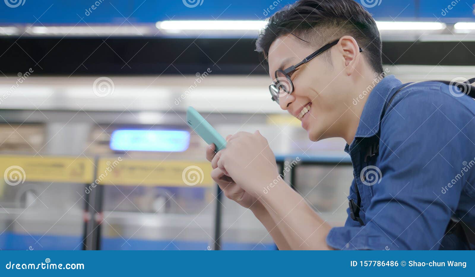 Young man use the phone stock photo. Image of communication - 157786486