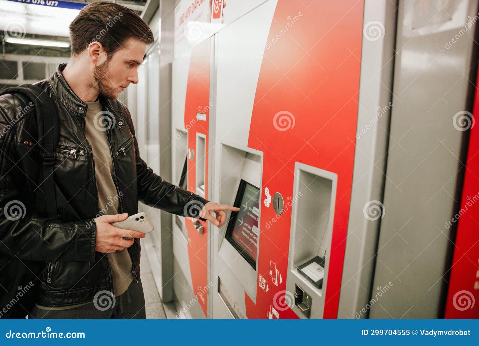 Young Man Using Atm Bank Machine while Standing in Subway Stock Image ...