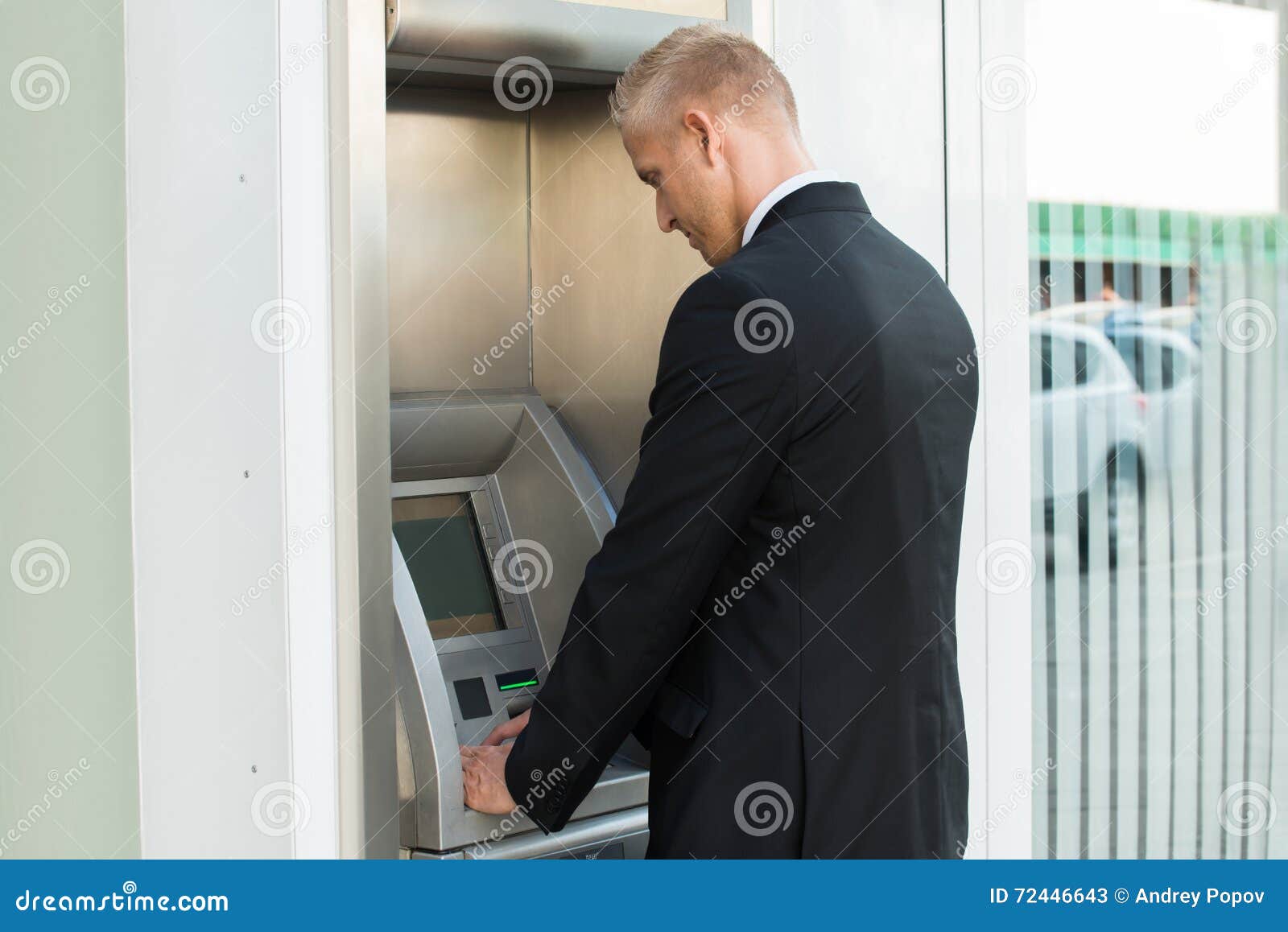 Young Man Using Atm Machine Stock Image - Image of reader, color: 72446643