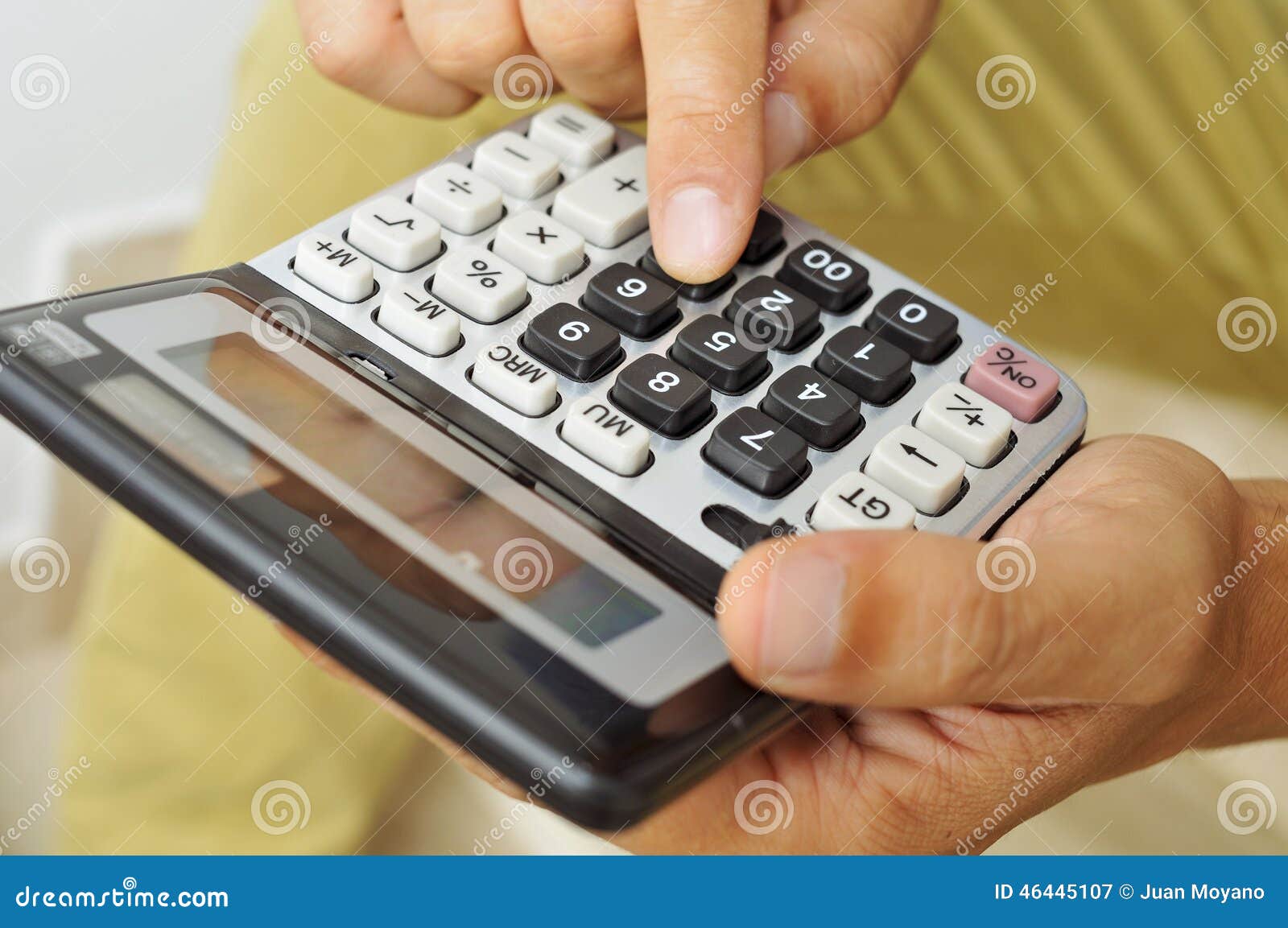 Young Man Using a Calculator Stock Image - Image of bills, debts: 46445107 Young Man Using a Calculator Stock Image - Image of bills, debts: 46445107