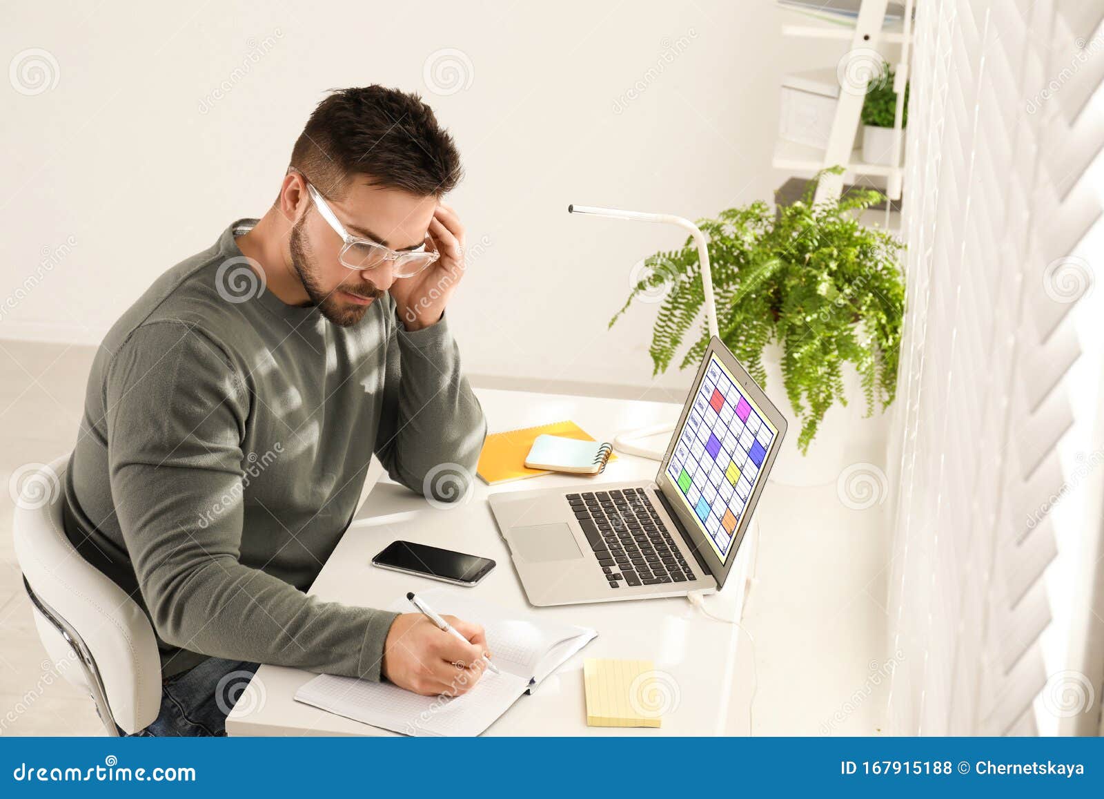 Young Man Using Calendar App on Laptop Stock Photo - Image of agenda ...