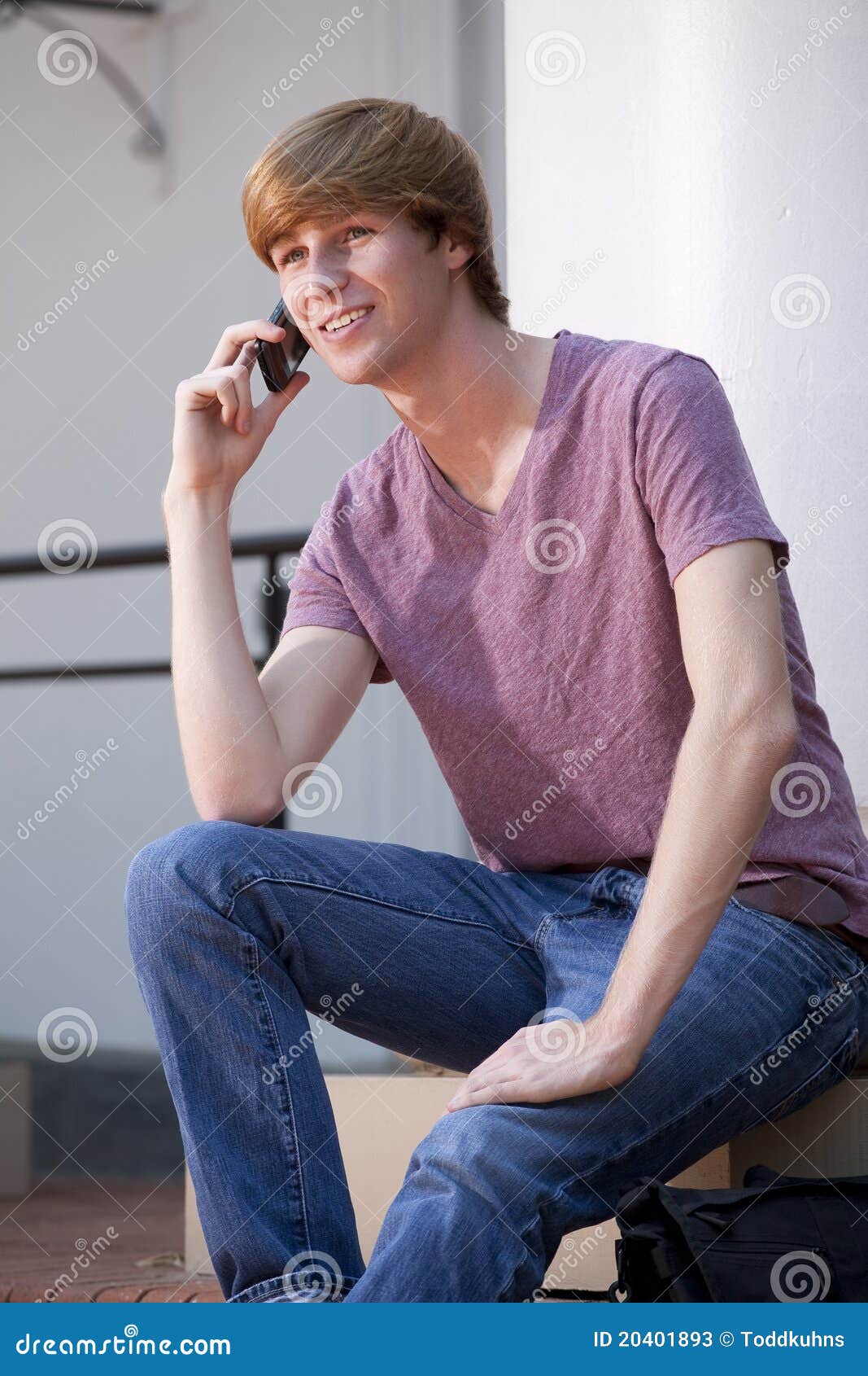 Young Man Using a Cell Phone Stock Image - Image of person, male: 20401893