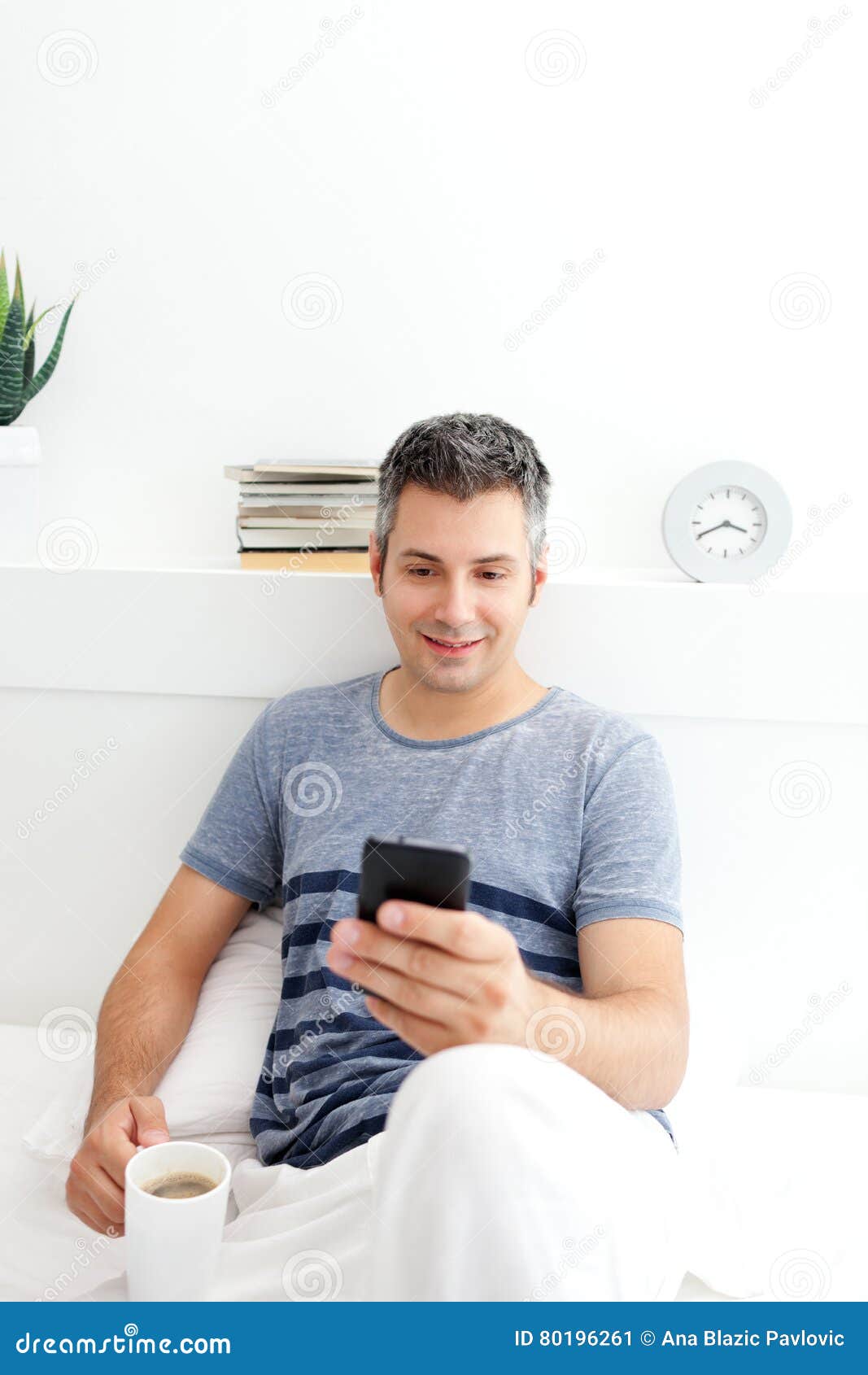 Young man using cell phone stock image. Image of message - 80196261