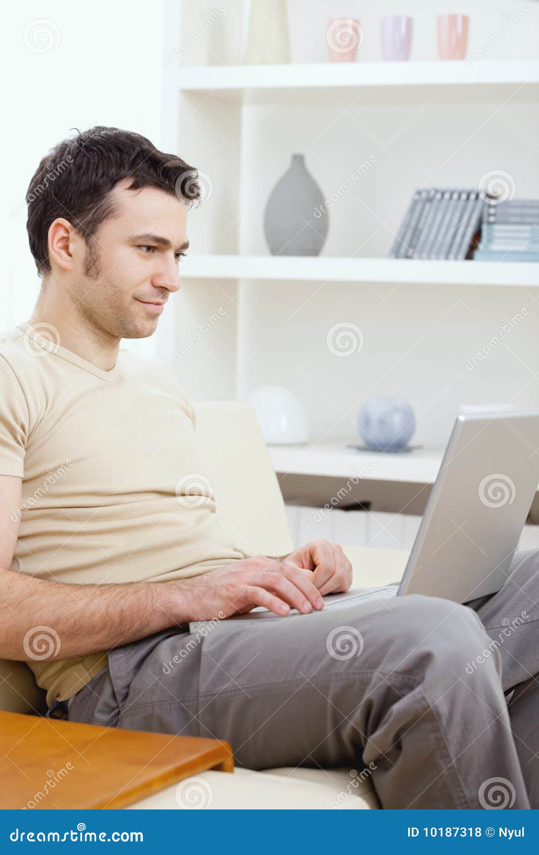 Young man using computer stock photo. Image of good, happiness - 10187318
