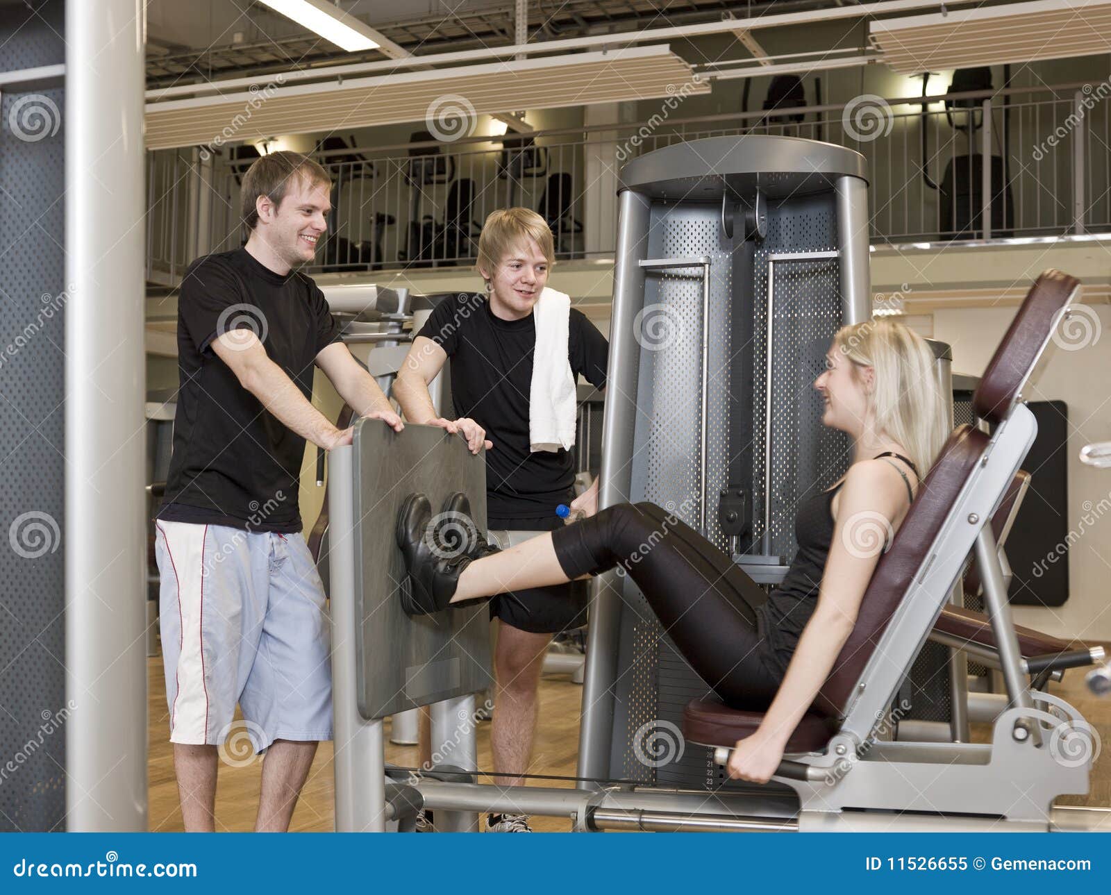 Young Man Using an Exercise Machine Stock Image - Image of health ...