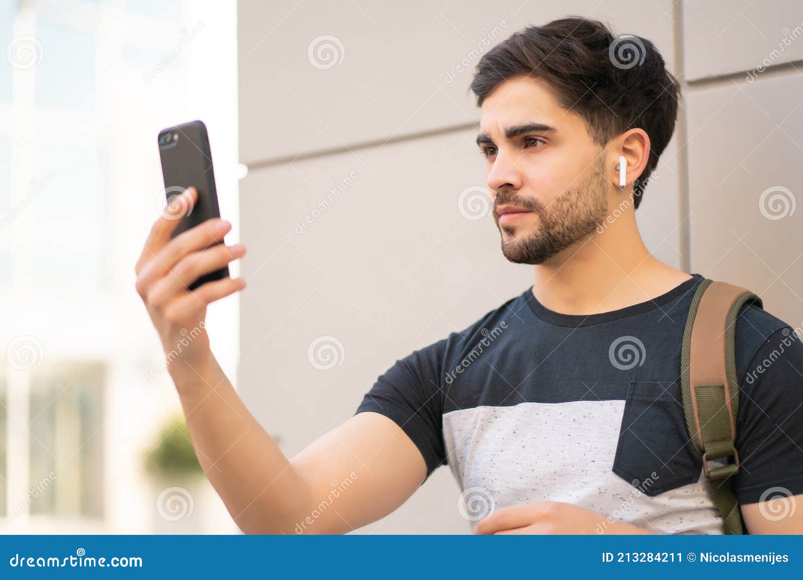 Young Man Using Face Id for Unlock Mobile Phone Outdoors. Stock Image ...