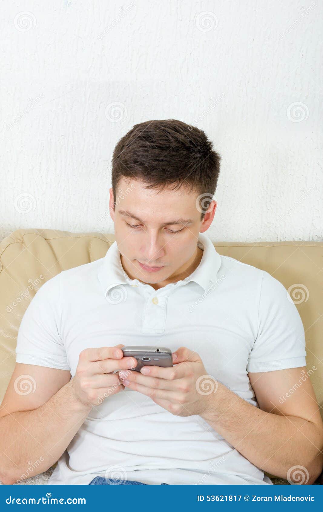 Young Man Using His Mobile Phone Stock Image - Image of cellphone, cell ...